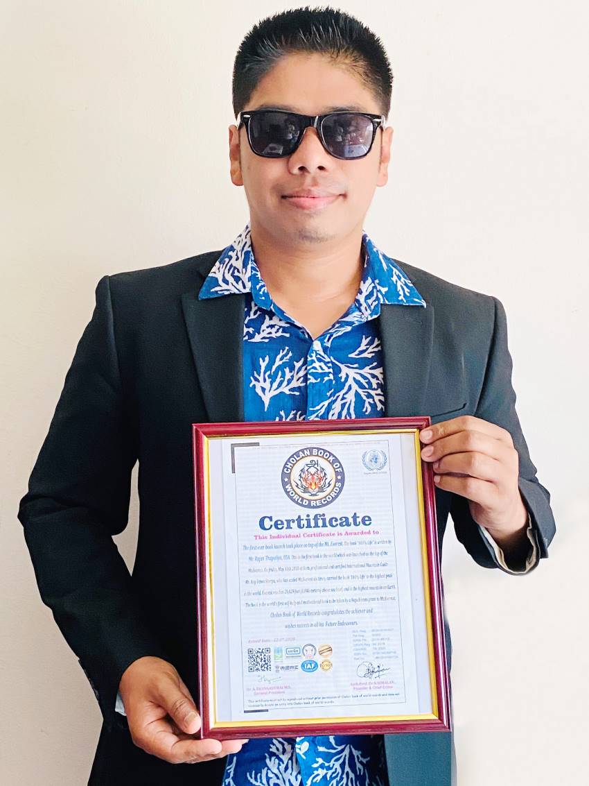 NY author's book launched atop Mount Everest | NRI Pulse